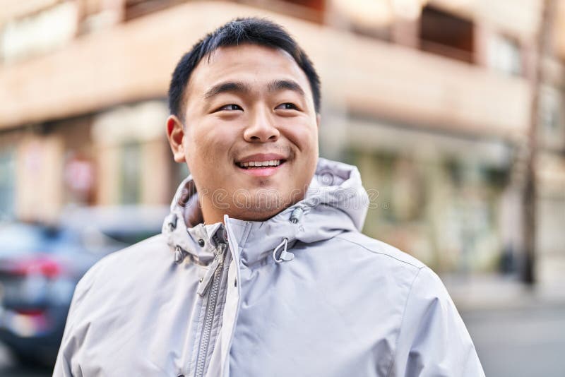 Young Chinese Man Smiling Confident Standing at Street Stock Photo ...