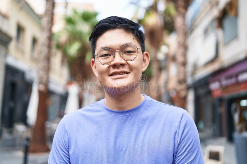 Young Chinese Man Smiling Confident Standing at Street Stock Photo ...