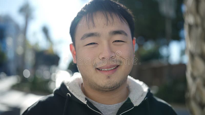 Young Chinese Man Smiling Confident Standing at Street Stock Image ...