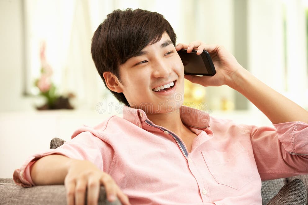 Young Chinese Man Using Mobile Phone Stock Image - Image of adult ...