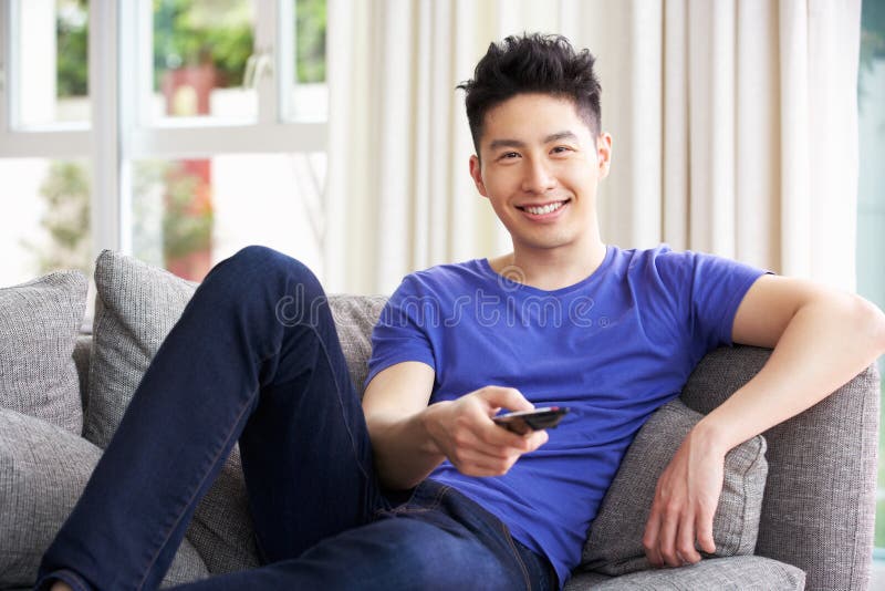 Young Boy Watching Television at Home Stock Photo - Image of camera ...
