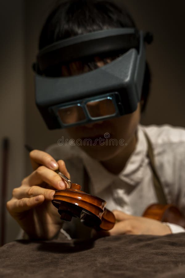 Young Chinese Violin Maker at Work in Her Workshop Stock Photo - Image ...