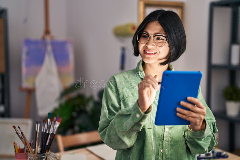 Young Chinese Woman Artist Smiling Confident Using Touchpad at Art ...