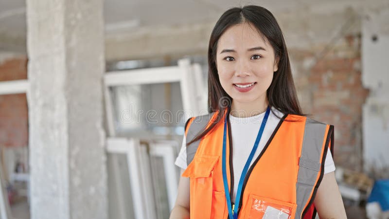 Young Chinese Woman Builder Smiling Confident Standing at Construction ...