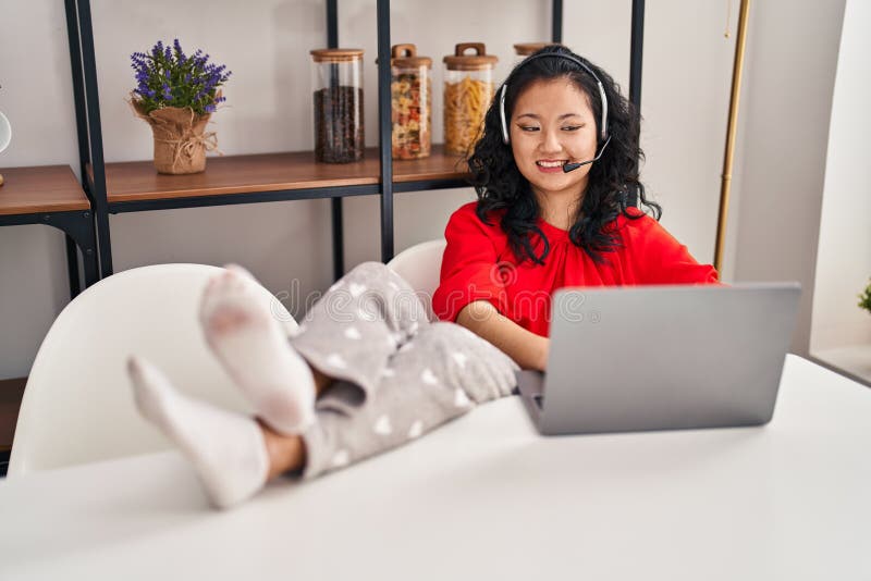 Young Chinese Woman Operator Having Video Call at Home Stock Photo ...