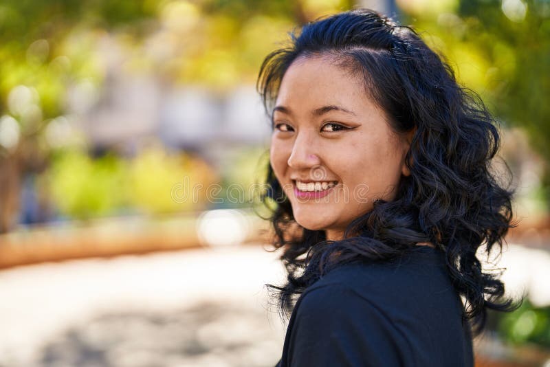 Young Chinese Woman Smiling Confident Standing at Park Stock Image ...
