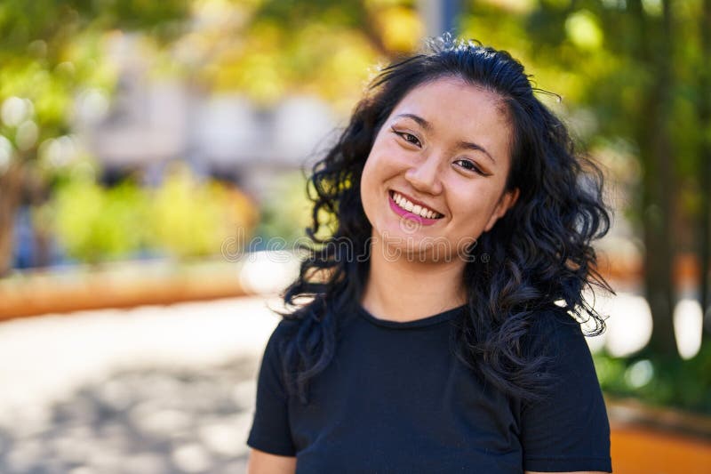 Young Chinese Woman Smiling Confident Standing at Park Stock Image ...