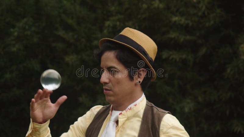 Young Circus Performer Masters a Ball Trick in a Park Stock Footage ...