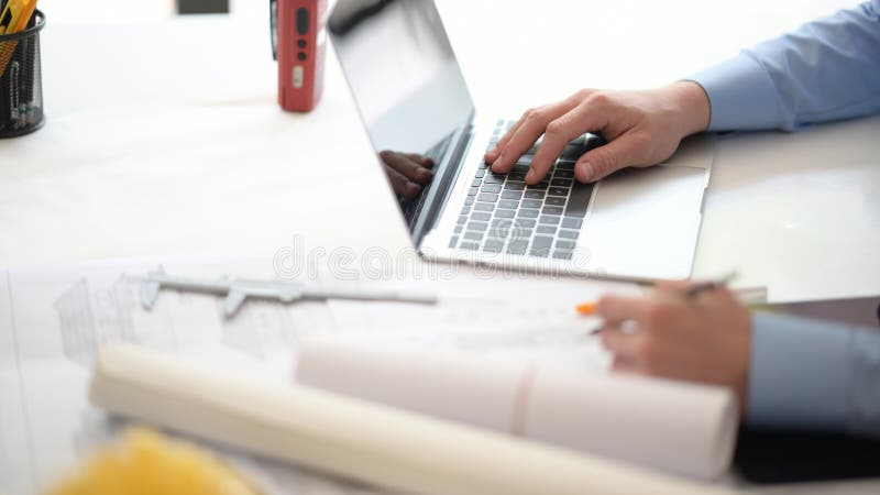Young Civil Engineer Working with Blueprints Stock Image - Image of ...