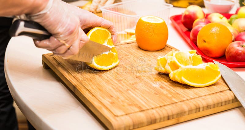 Young Clean Chef Hands Cutting Orange on Table Stock Image - Image of ...