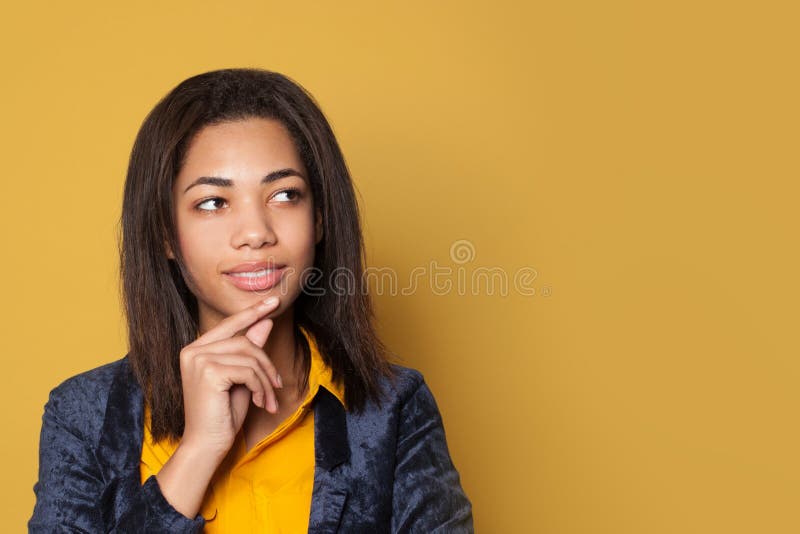 Young Clever Woman Thinking on Yellow Stock Image - Image of model ...