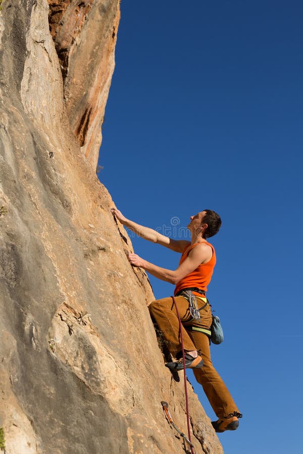 Young Climber Hanging by a Cliff Stock Image - Image of forest, courage ...