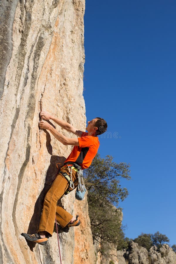 Young Climber Hanging by a Cliff Stock Image - Image of forest, courage ...