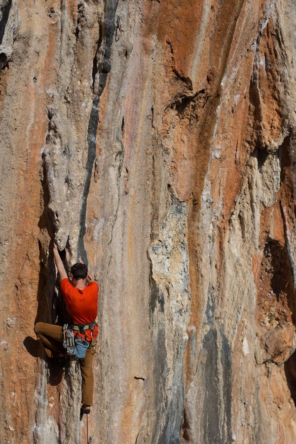 Young Climber Hanging by a Cliff Stock Image - Image of forest, courage ...