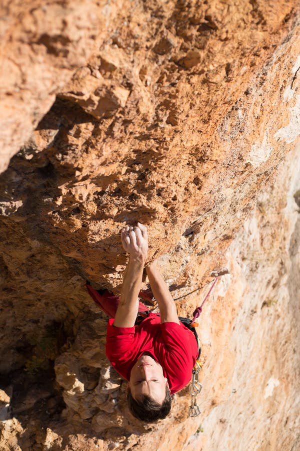 Young Climber Hanging by a Cliff. Stock Image - Image of fingers, high ...