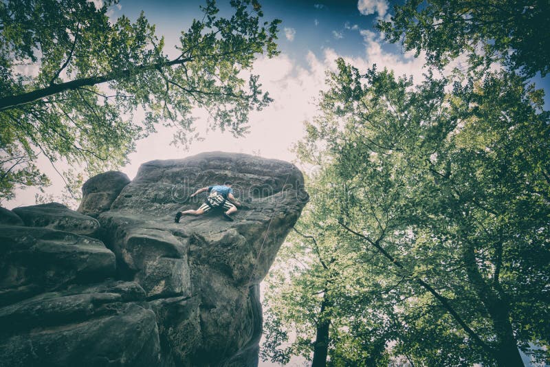 Young Climber Hanging by a Cliff Stock Photo - Image of balance ...