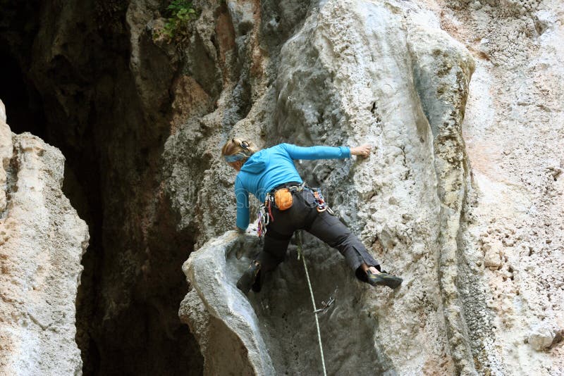 Young Climber Hanging by a Cliff Stock Photo - Image of cliff, balance ...