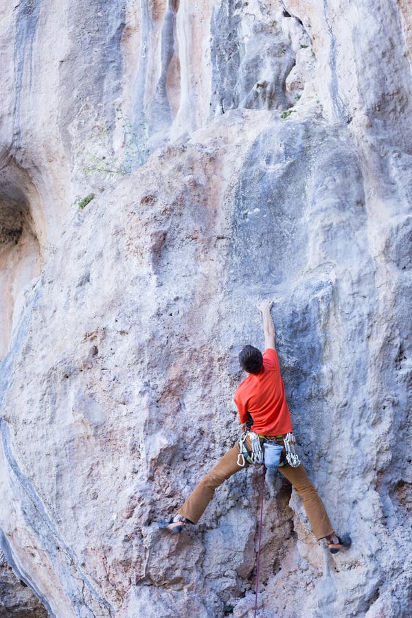 Young Climber Hanging by a Cliff Stock Image - Image of hiking, dangle ...