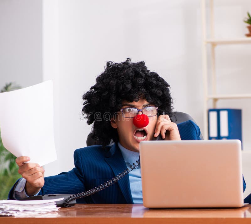 Young Clown Businessman Working in the Office Stock Photo - Image of ...