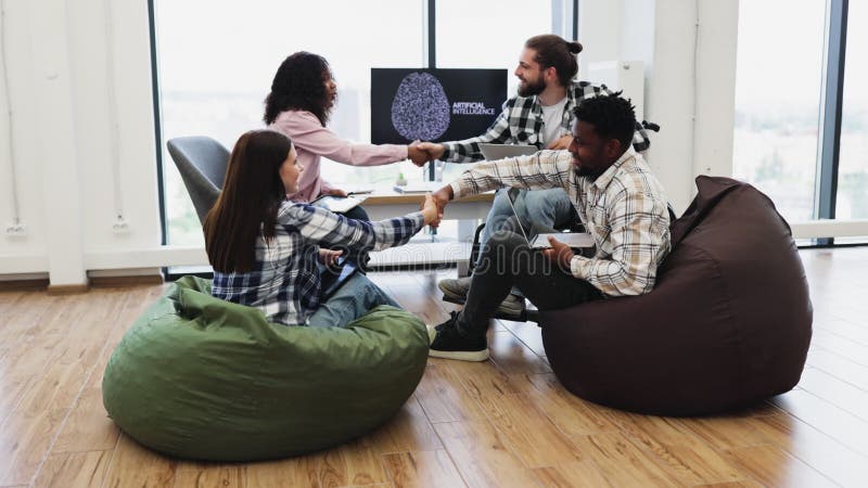 Team Collaborating on Artificial Intelligence Project in a Modern ...