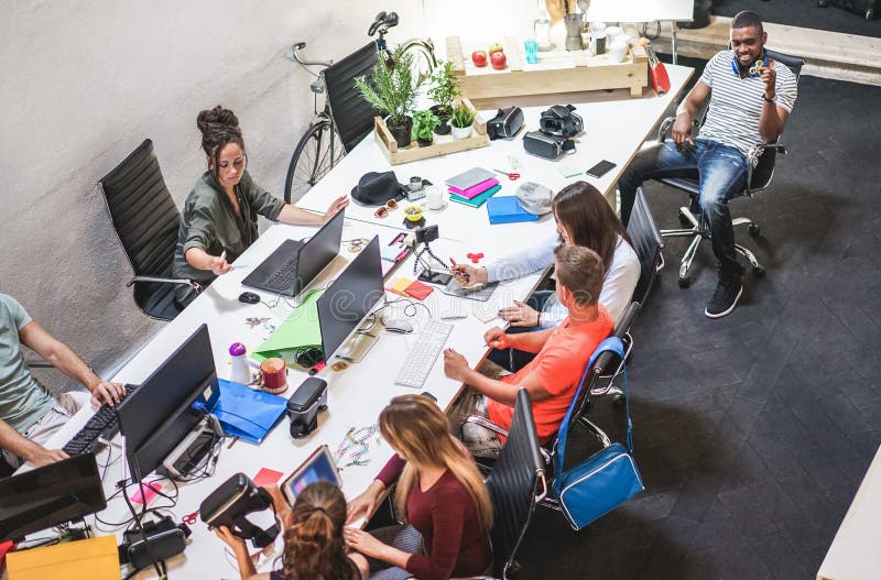 Young Co-workers Team Talking during Startup - Happy People Planning a ...
