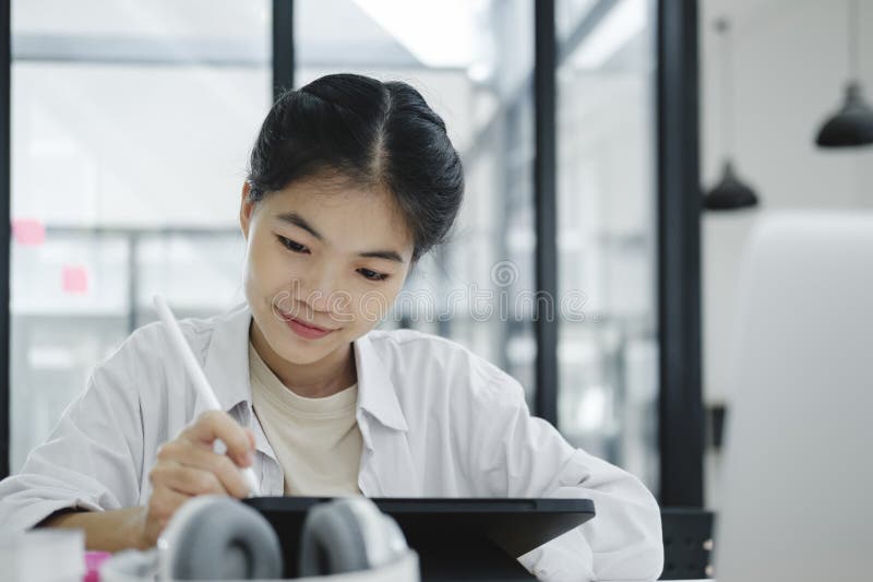Young Collage Student Using Computer and Mobile Device Studying Online ...