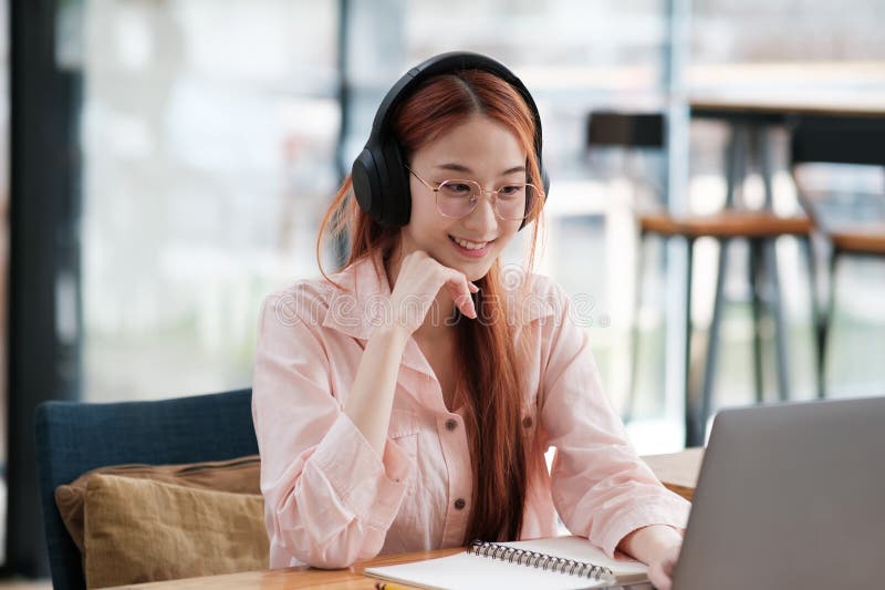 Young Collage Student Using Computer and Mobile Device Studying Online ...
