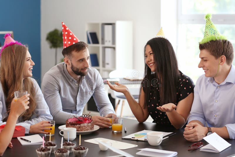 Happy Colleagues at Surprise Party for Young Woman on Her Birthday in ...