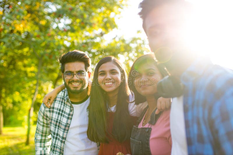 Young Colleagues Discussing Ideas Outdoors Social Distance Stock Image ...