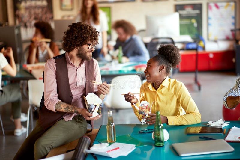 Young Colleagues Eating Together on the Break Stock Image - Image of ...