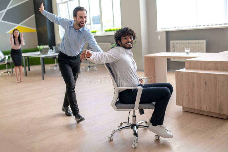 Young Colleagues Having Fun in the Office after Work Stock Photo ...