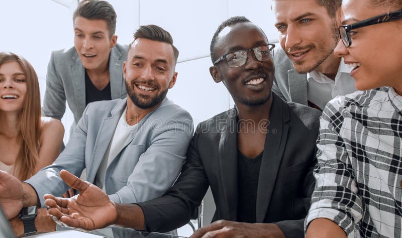 Young Colleagues Looking at Laptop with Smile on Face Stock Image ...