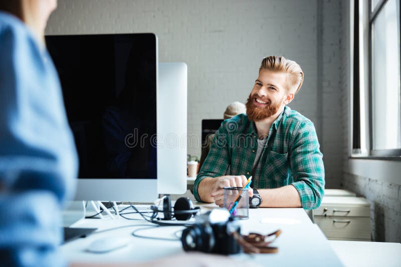 Young Colleagues Work in Office Using Computers Stock Image - Image of ...
