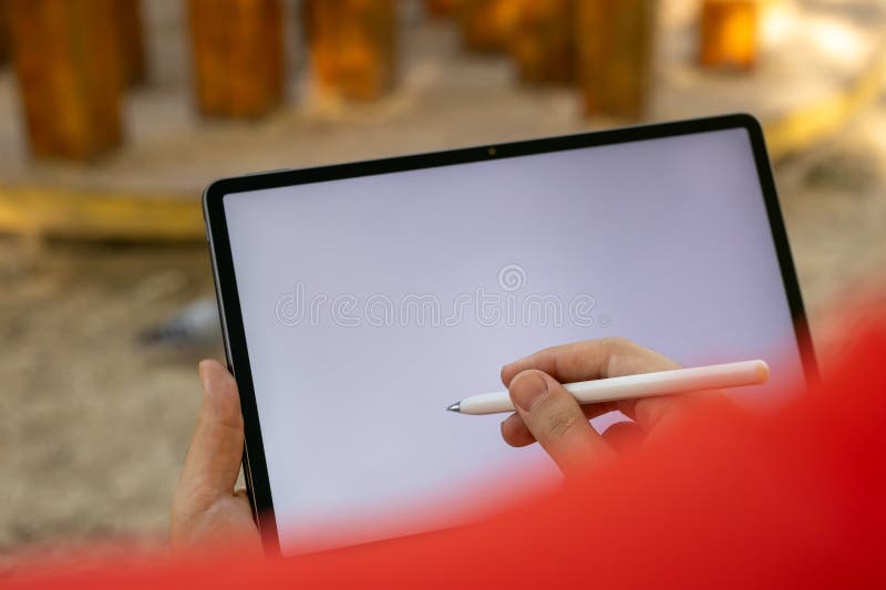 Young College Boy Using Blank Screen Tablet with Stylus Pen while ...