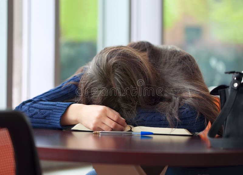 Young College or High School Student Asleep on Table Stock Image ...