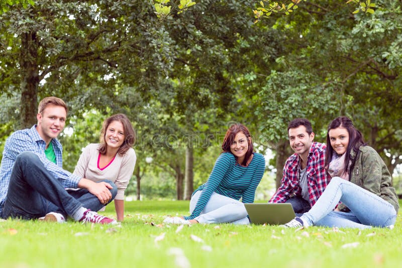 Young College Students Using Laptop in the Park Stock Photo - Image of ...