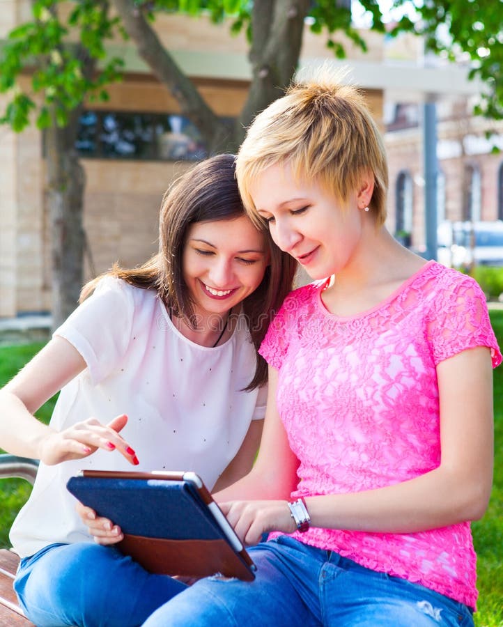 Young College Students Using Tablet Computer Stock Photo - Image of ...