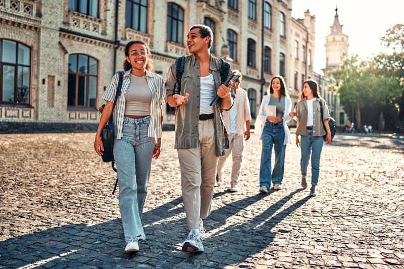 Young College Students Walking on Campus after Classes. Stock Image ...