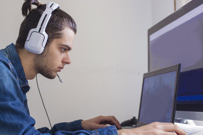 Young with computer stock image. Image of listening - 135188439
