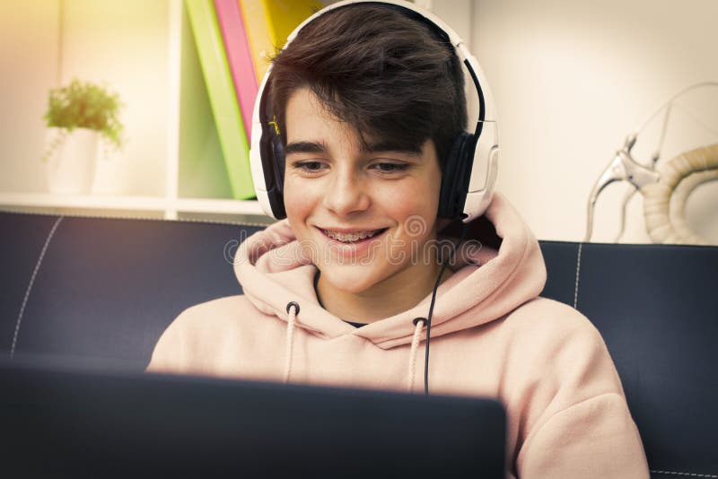 Young with Computer and Headphones Stock Image - Image of listening ...