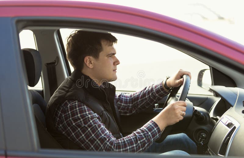 Young Concentrated Man Driving a Car Stock Image - Image of enjoying ...