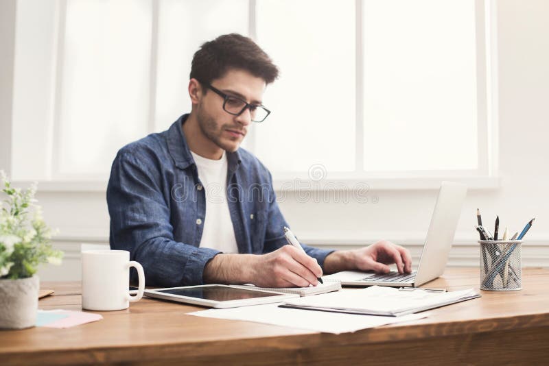 Young Businessman Working with Laptop in Office Stock Image - Image of ...
