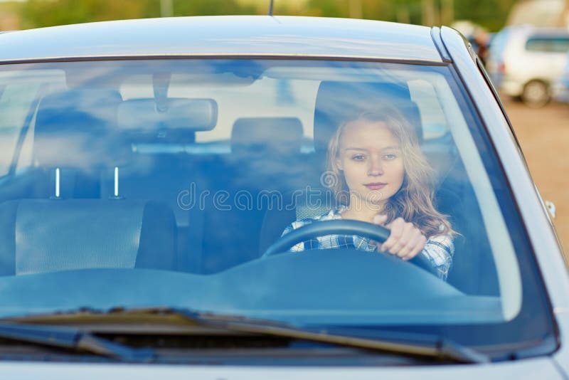 Young Confident Woman Driving a Car Stock Photo - Image of casual ...