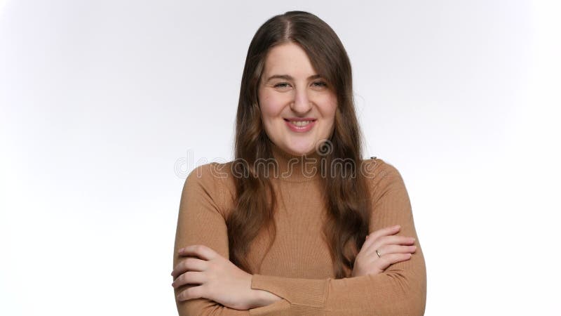 Young Confident Woman Winking Eye and Smiling in Camera Stock Footage ...