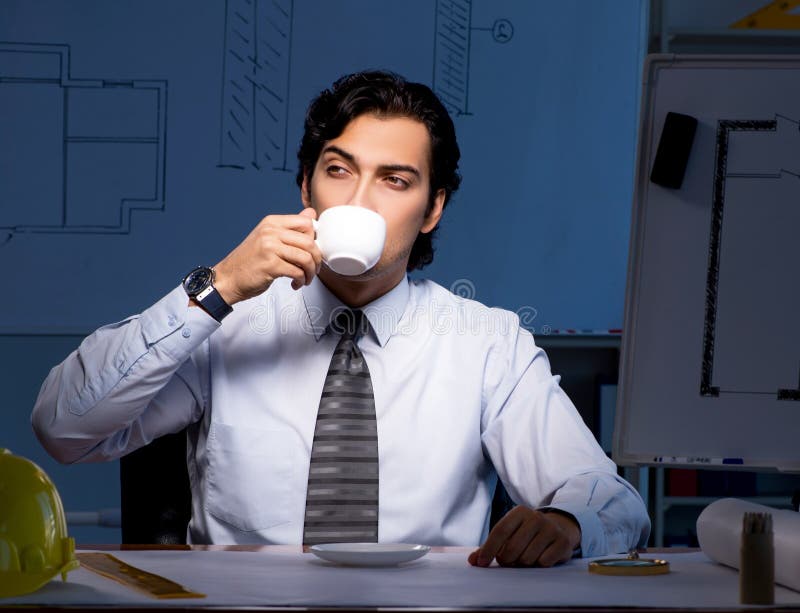 Young Construction Architect Working on Project at Night Stock Image ...