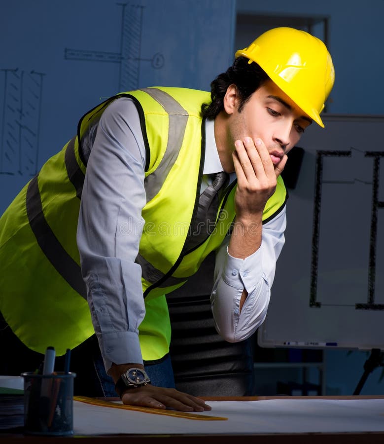 Young Construction Architect Working on Project at Night Stock Image ...