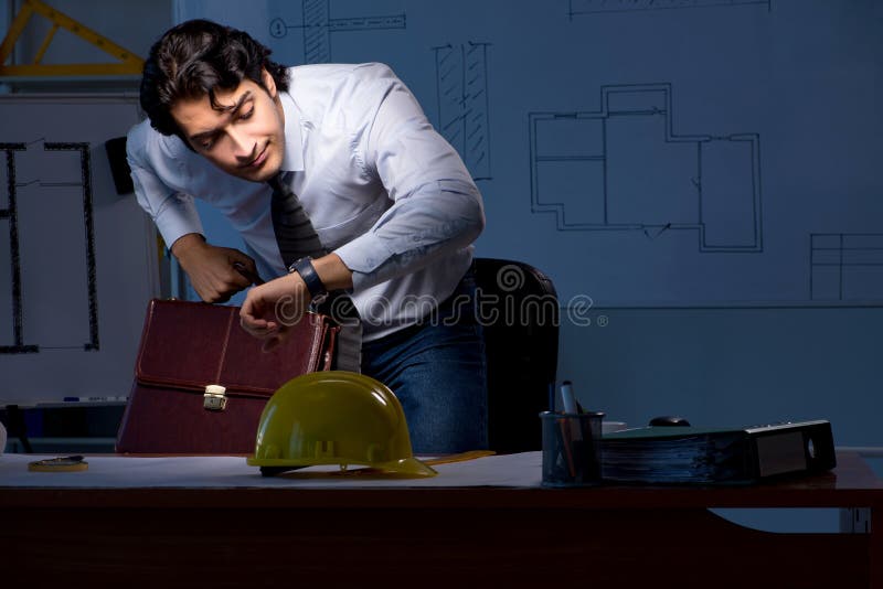 The Young Construction Architect Working on Project at Night Stock ...