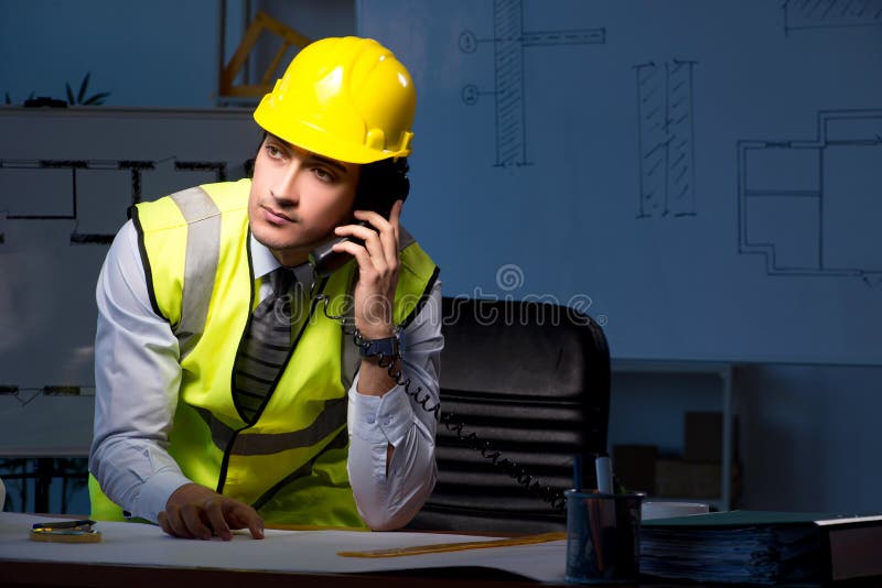 The Young Construction Architect Working on Project at Night Stock ...