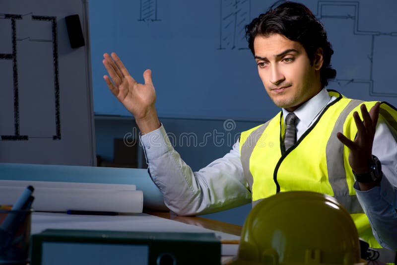 The Young Construction Architect Working on Project at Night Stock ...