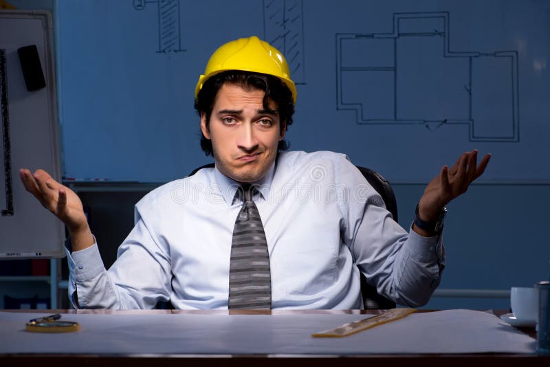 The Young Construction Architect Working on Project at Night Stock ...